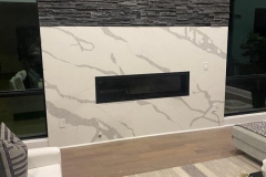 Calacatta Magnifico Quartz Countertops and Fireplace Project in Short ...